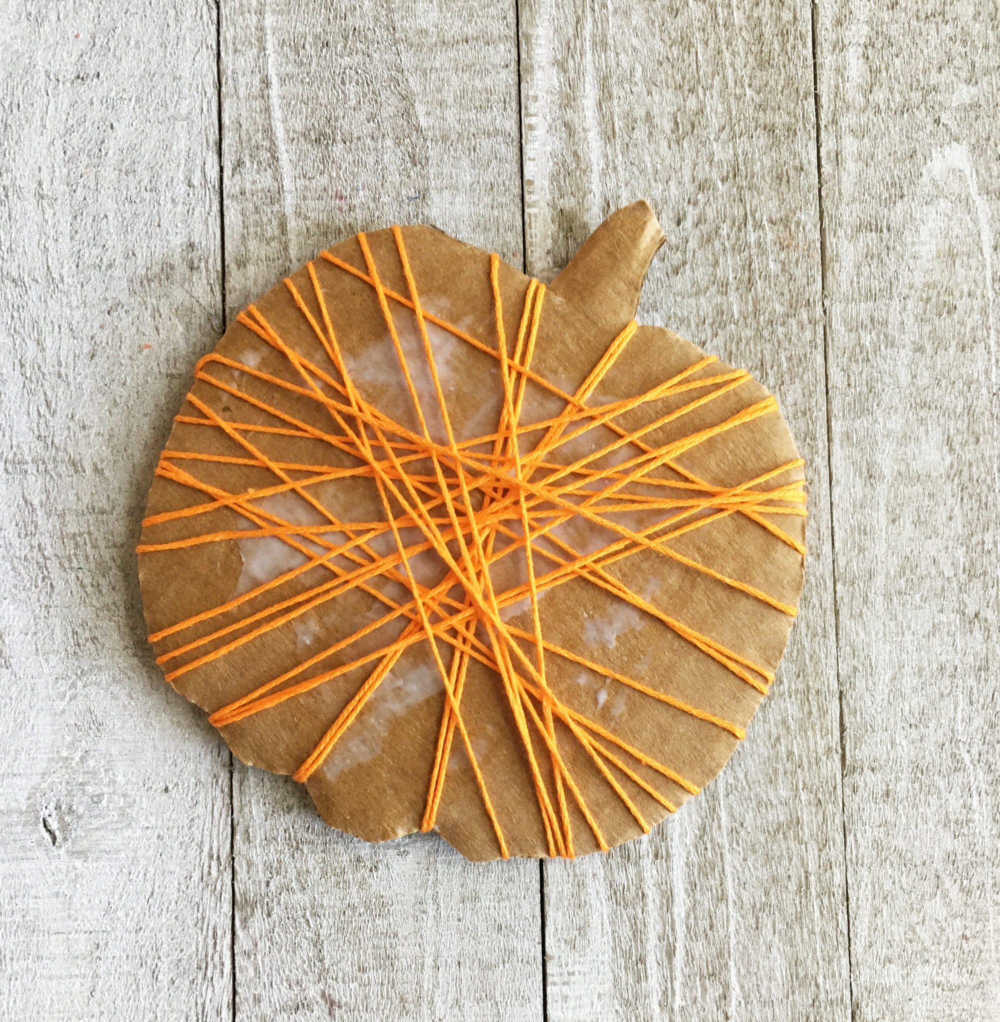 Yarn Pumpkin Craft (FREE Printable Pumpkin) - Little Bins for Little Hands