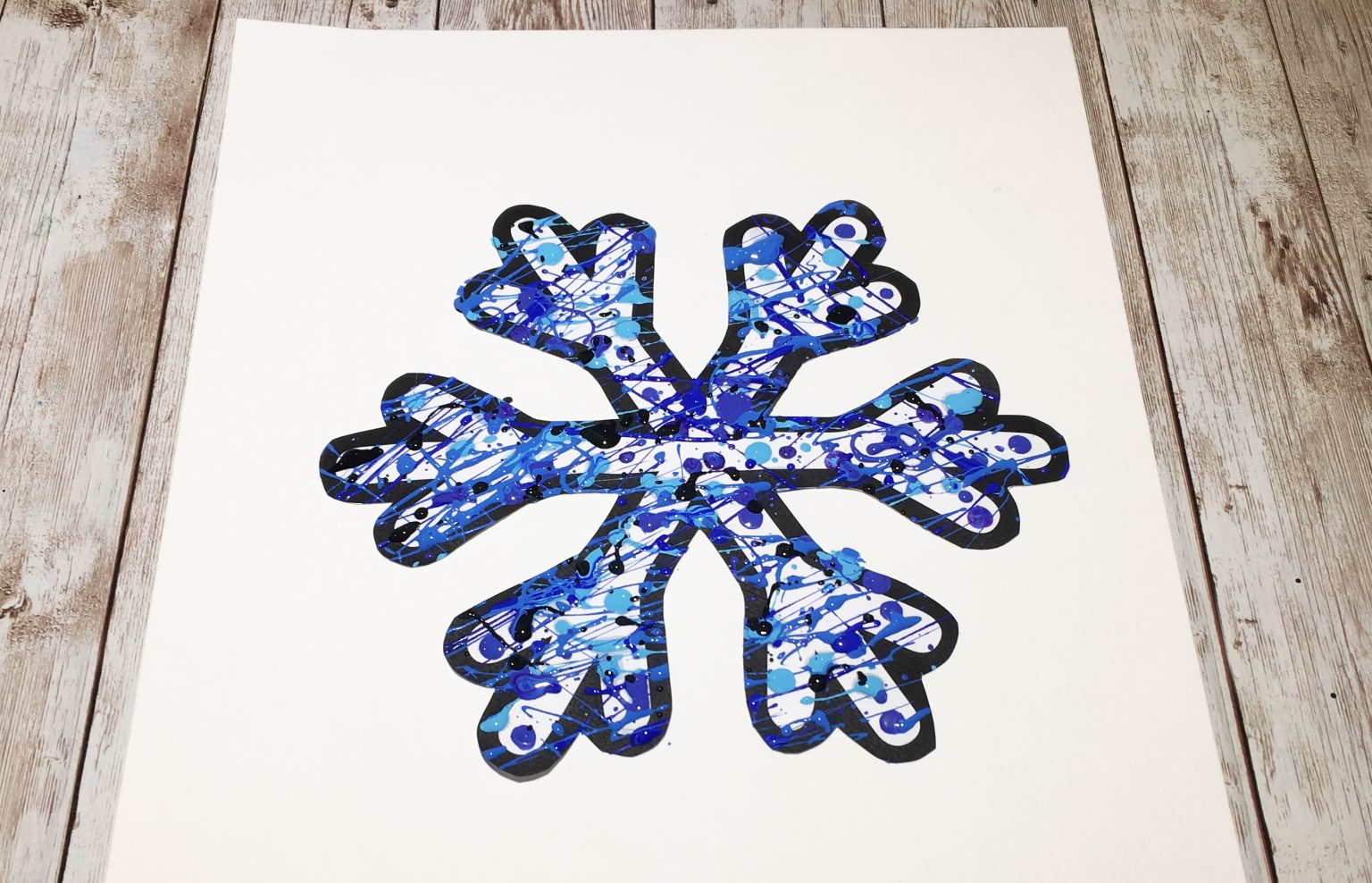 Pollock Winter Snowflake Painting - Little Bins for Little Hands